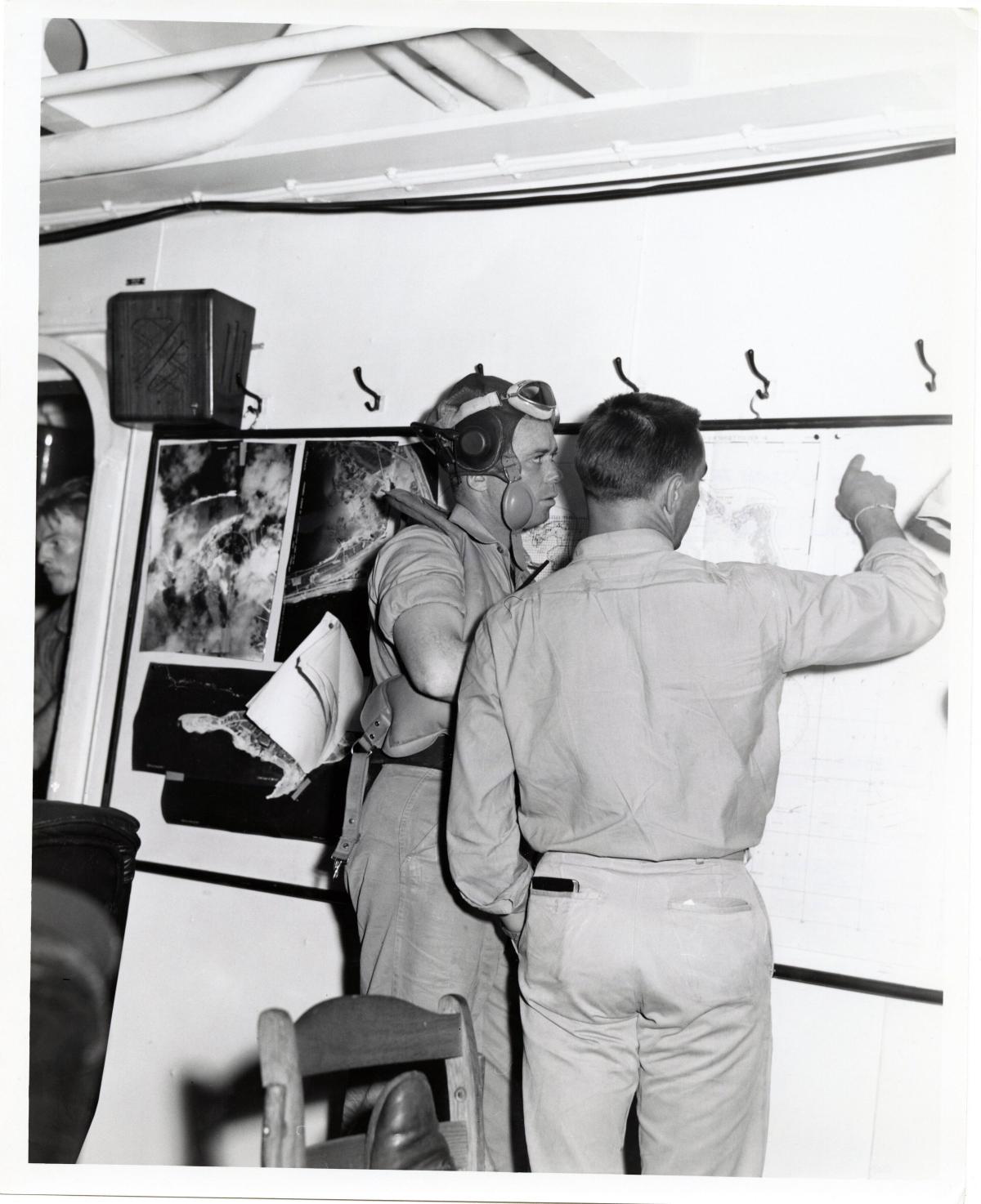 Checking Charts in the Ready Room | Patriots Point Naval & Maritime Museum