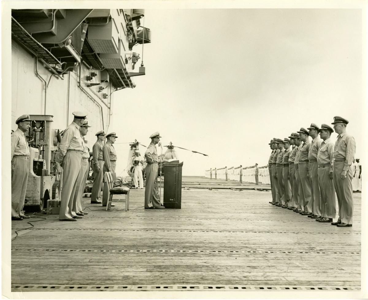 Captain Arnold McKechnie Addressing the Crew of the USS Yorktown (CVA ...